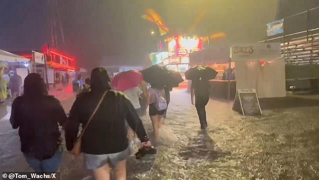 14 million US residents remain under flood alerts as torrential rain ...