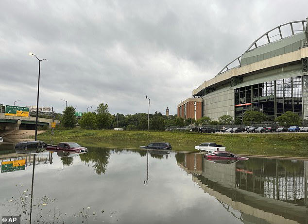 Shocking scenes as Brewers' parking lot is flooded and rain leaks ...