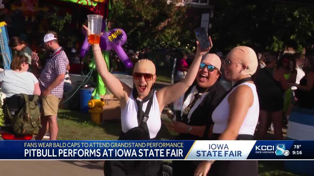 Pitbull fans dress up as 'Mr. Worldwide' at fairgrounds for Grandstand ...