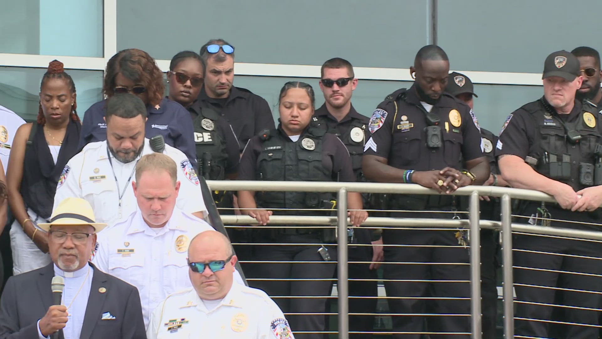 Dozens gather to pray for injured Ferguson police Officer Travis Brown
