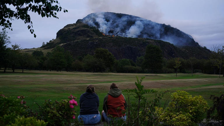 Firefighters dampen down hotspots after battling blaze at Edinburgh ...