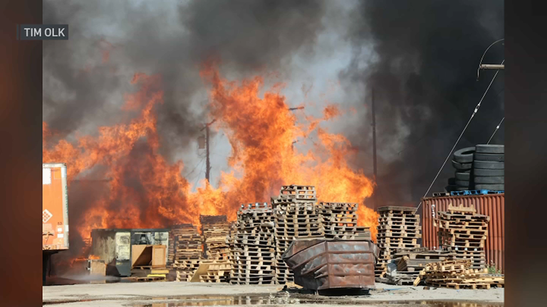Firefighters battle massive fire at Gary pallet company