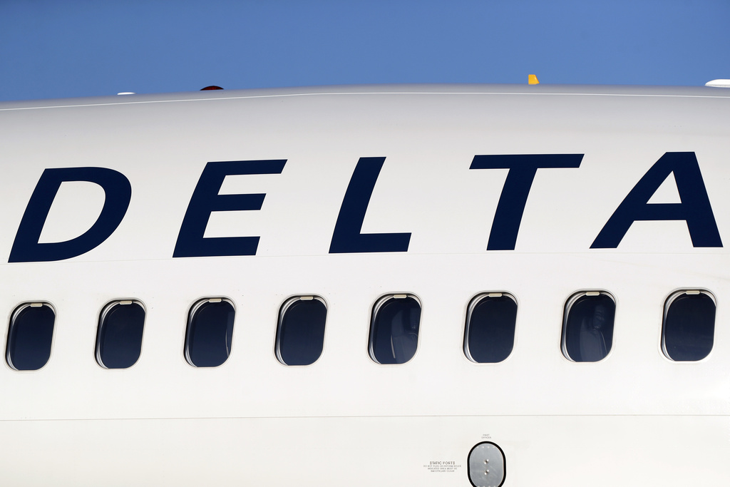 Delta plane wing clips empty aircraft during pushback from gate in Atlanta