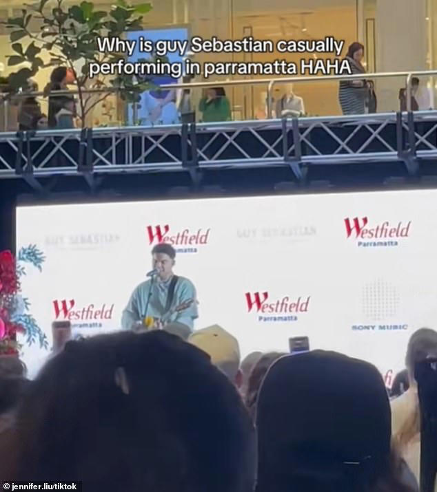 Guy Sebastian launches new album to 'eight' fans at rundown shopping centre