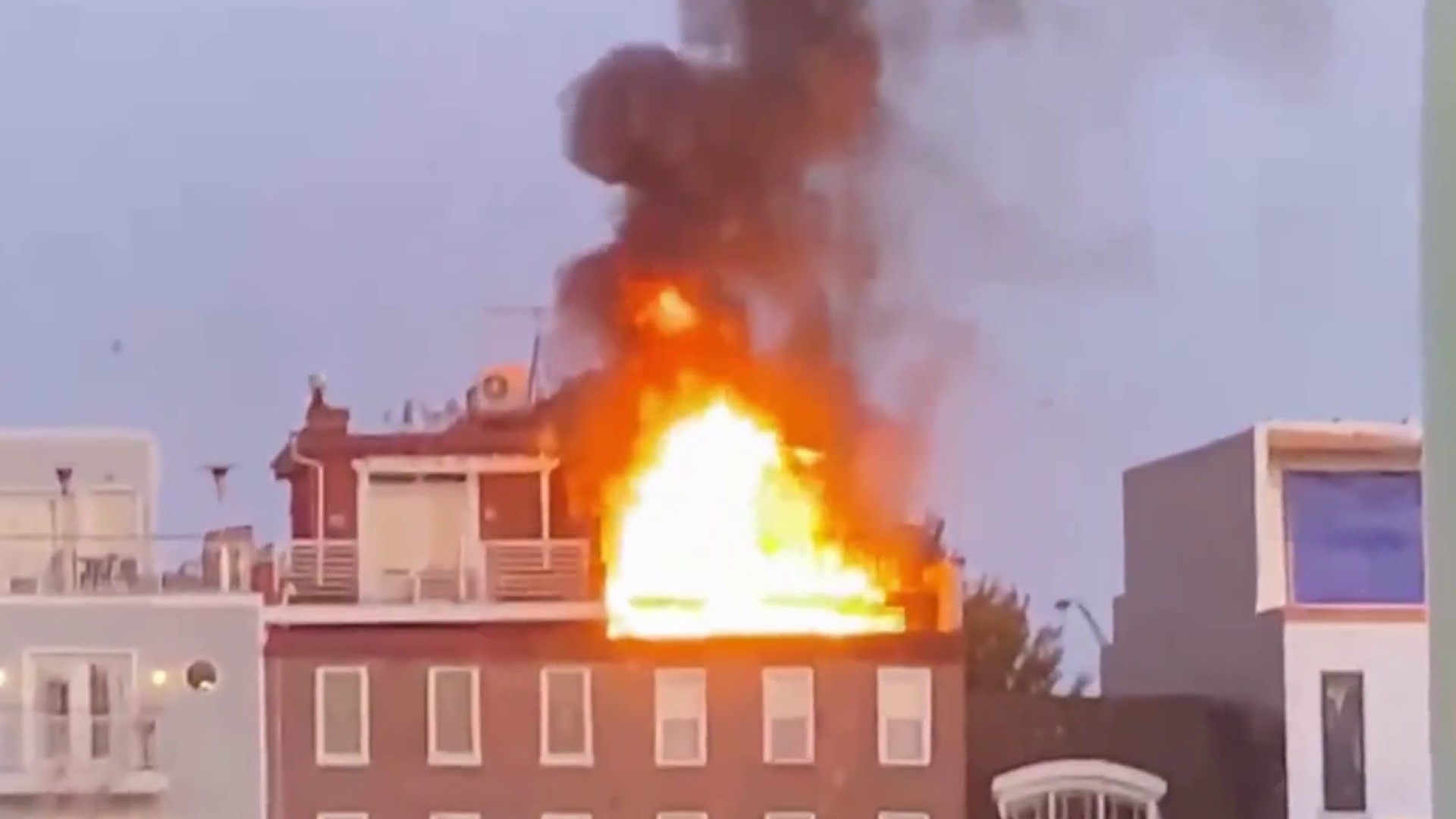 Fire crews work to extinguish fire as flames tear through Old City roof ...