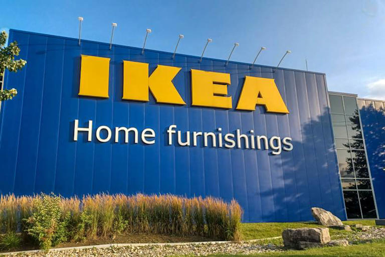 IKEA's showrooms convinced me to put coat hooks above my bed