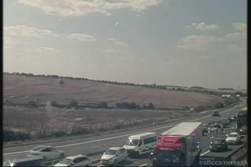 Driver suffers 'serious' injuries in 3-car crash that closed M11 for hours