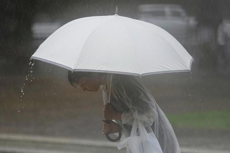 Several people reported missing after powerful rains lash southern Japan