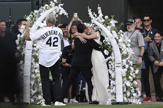 Die-Hard Chicago White Sox Fans Marry on Stadium Field During Game in ...