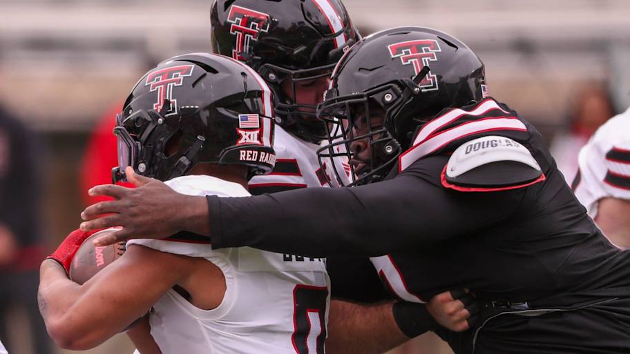 Texas Tech's Lee Hunter, Jacob Rodriguez, and David Bailey land on the ...