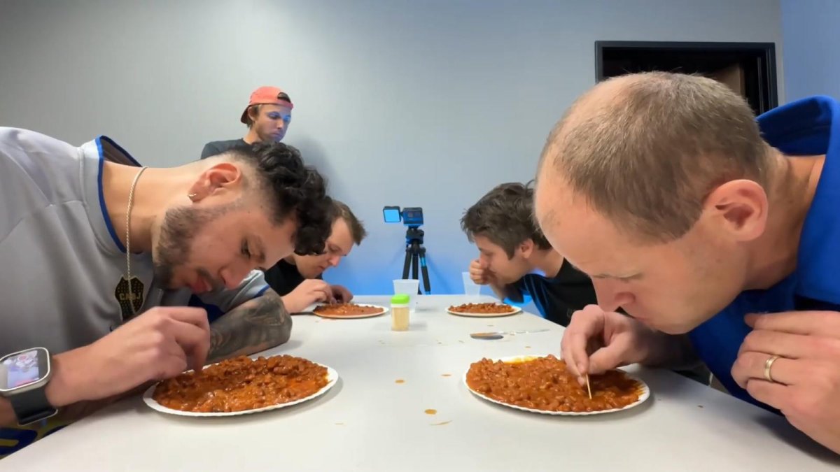 Watch: Four men eat beans with toothpicks to break world record