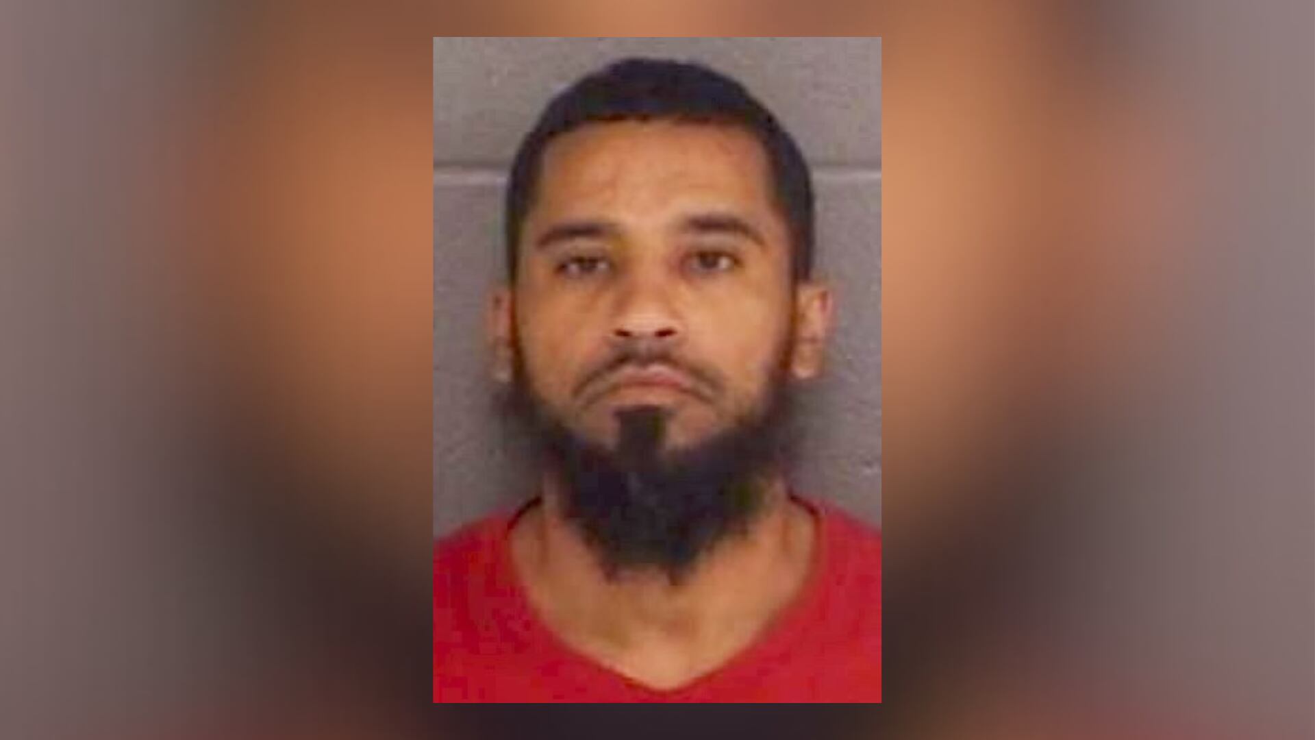 Man arrested after search warrant leads to stolen guns, drugs found in ...