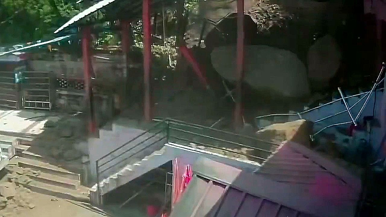 Locals flee as massive landslide crashes into popular temple in India