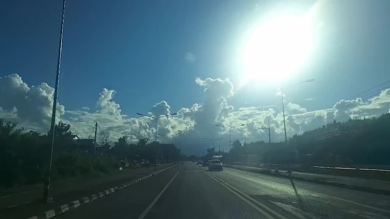 Unusual cloud formation like giant dragon chasing sun amazes locals