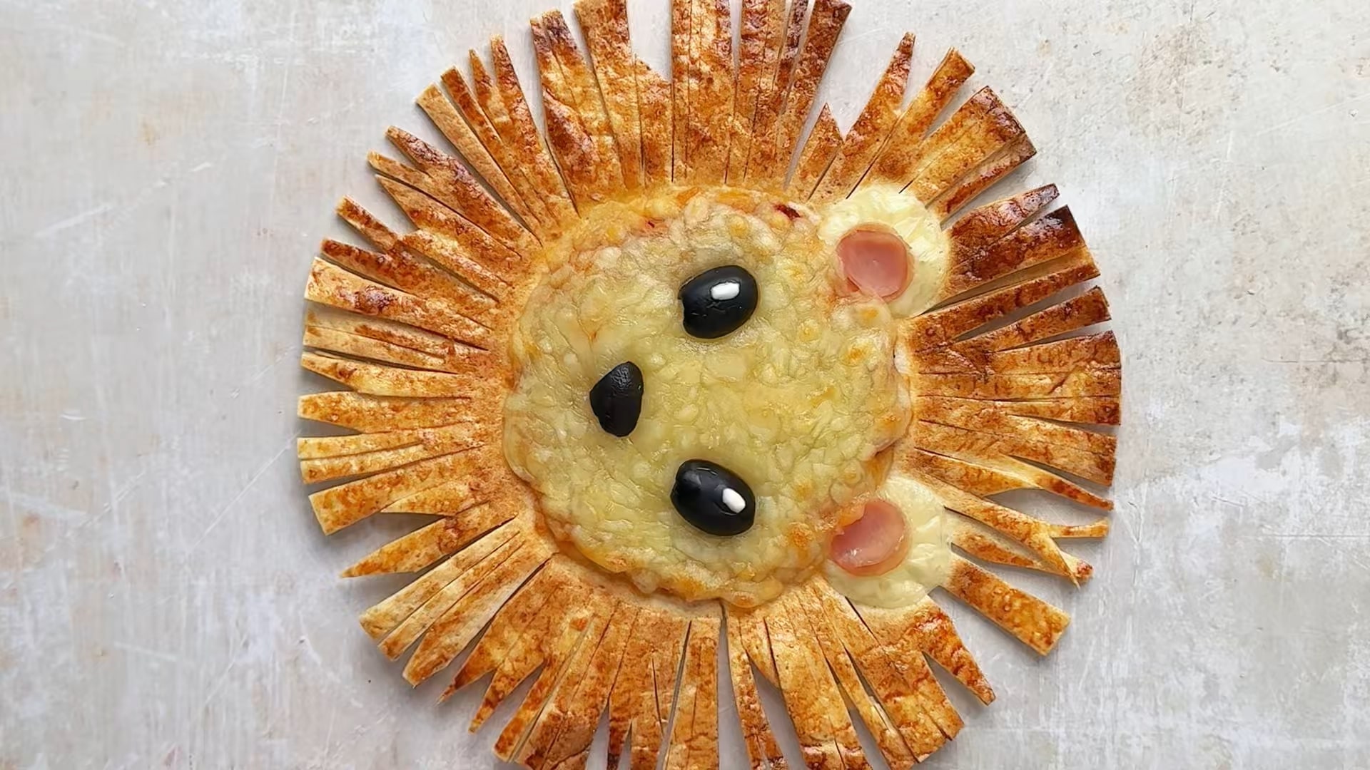 Lion pizza, crispy, gooey and SO fun