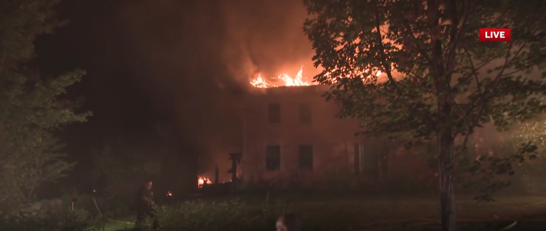 Woman, 2 dogs found dead after NH house fire, officials say
