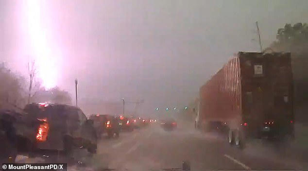 Moment lightning strike causes tower of flames in South Carolina as ...