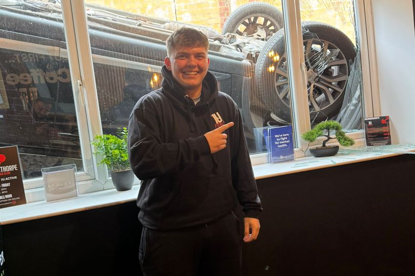 Huddersfield gym trainer's shock as 'runaway' car gets wedged between ...