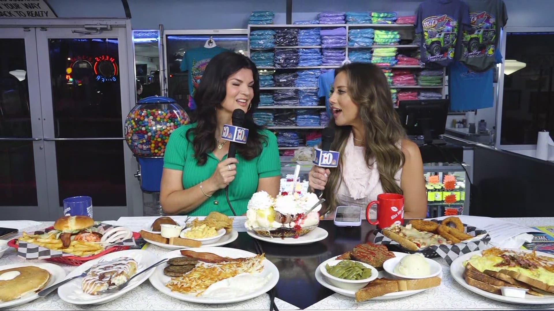 Abby Ham and Heather Waliga try a banana split at Mel's Diner in Pigeon ...