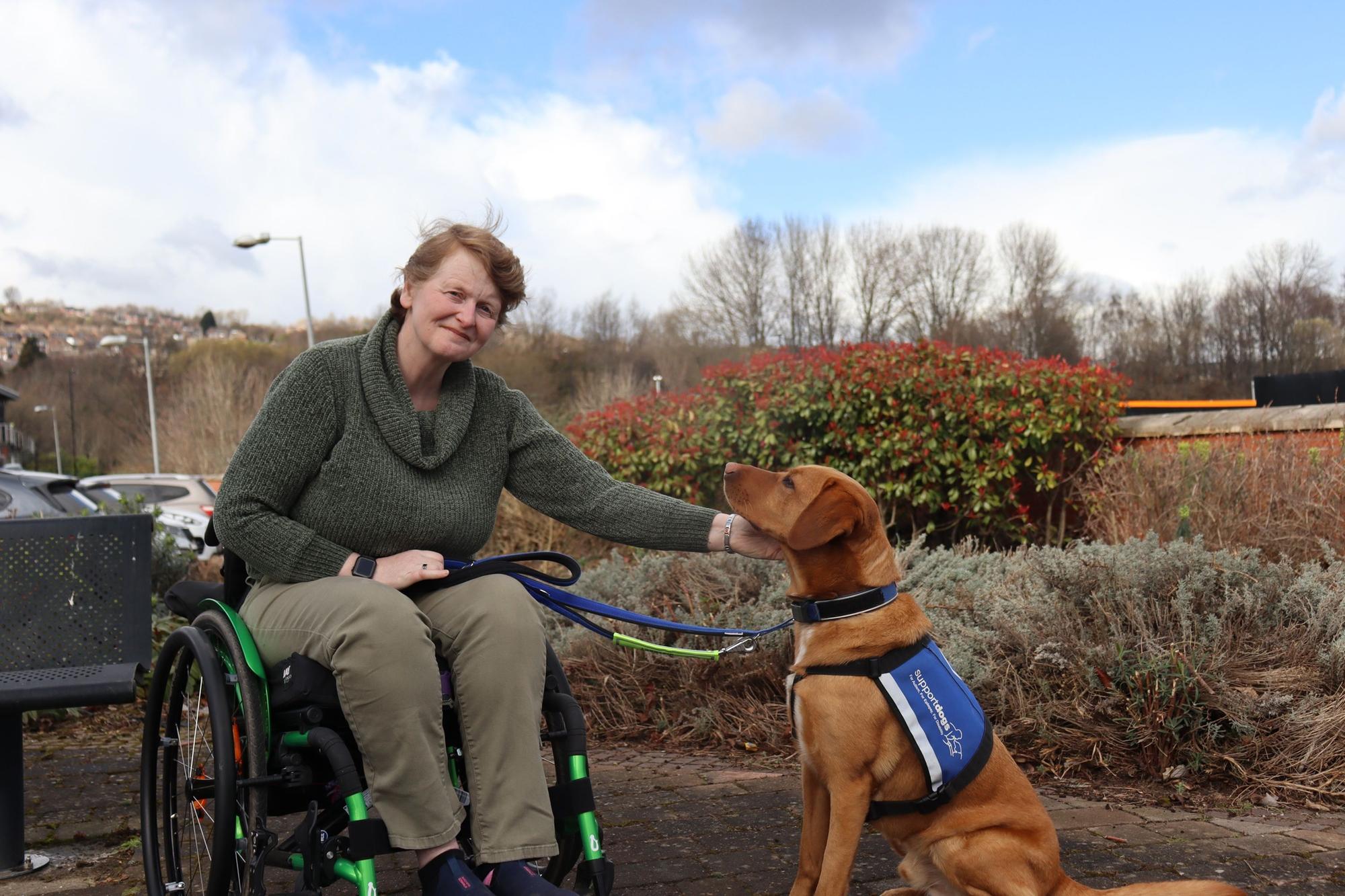 No limits for Amanda thanks to faithful support dogs