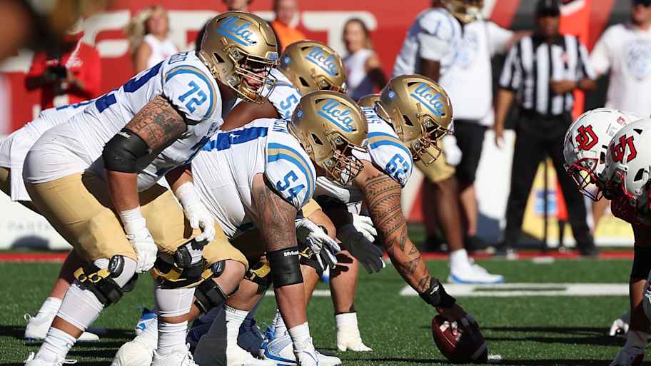 Foster Cross-Training O-Line at Center in UCLA Camp