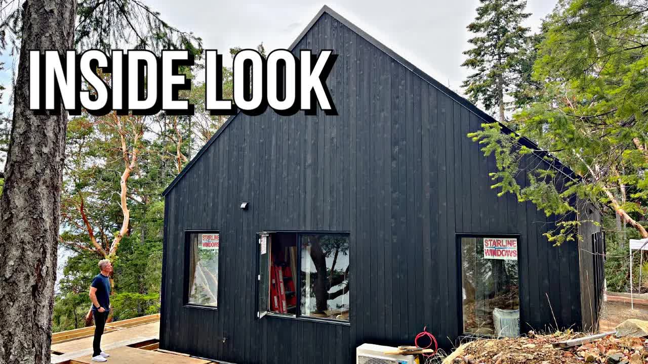 They built a 1700 square foot prefab home with 20 foot ceilings... wow