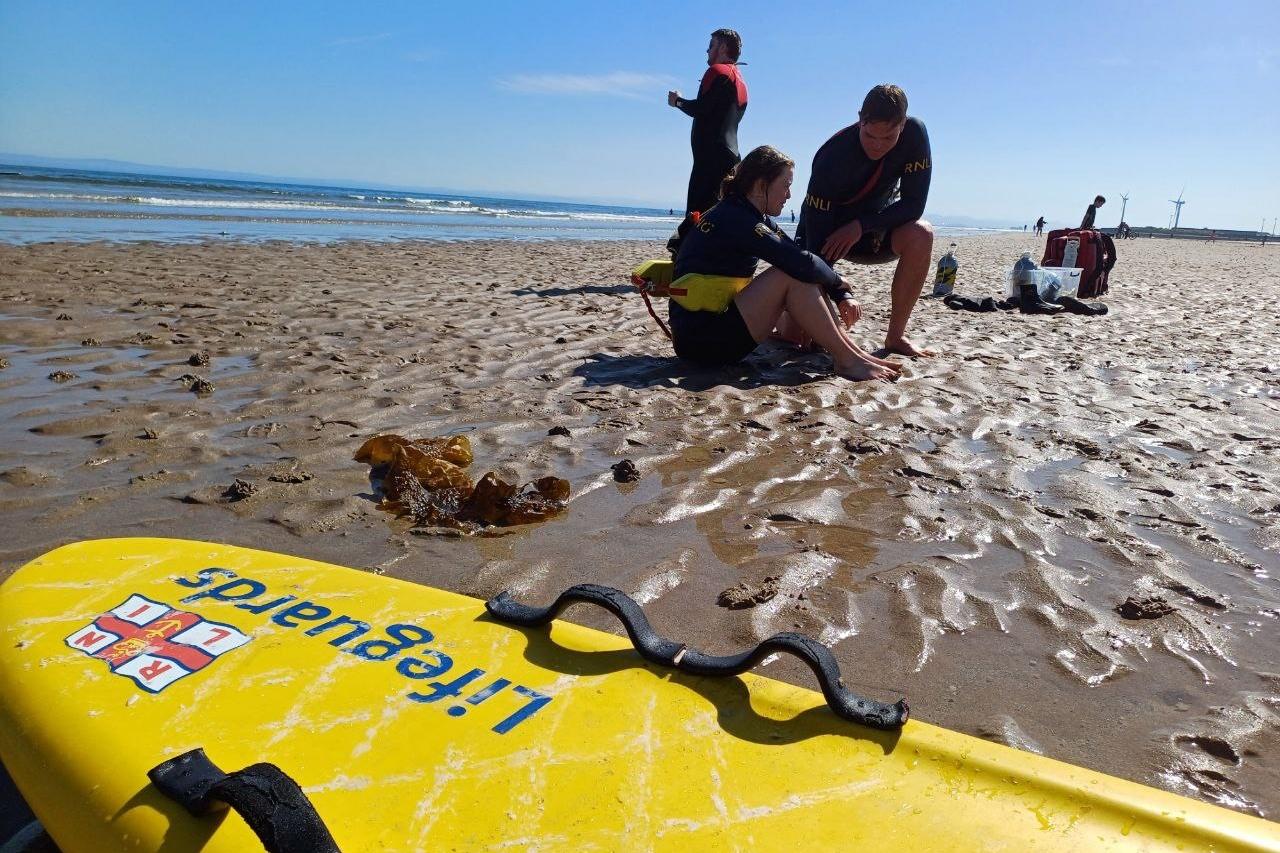 RNLI lifeguard races 200m to save paddleboarder at Fife beach