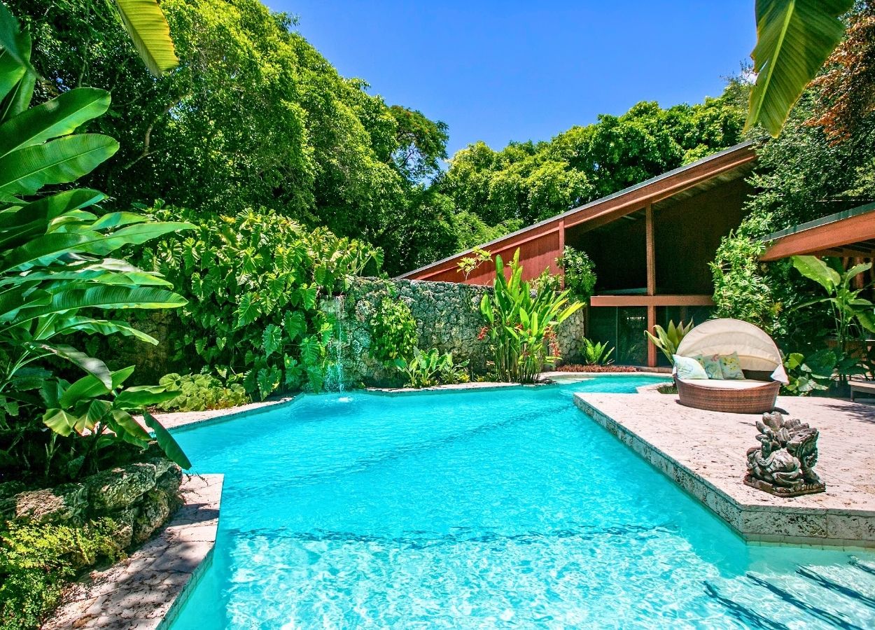 Frank Lloyd Wright meets tropical Miami in this 1970s home