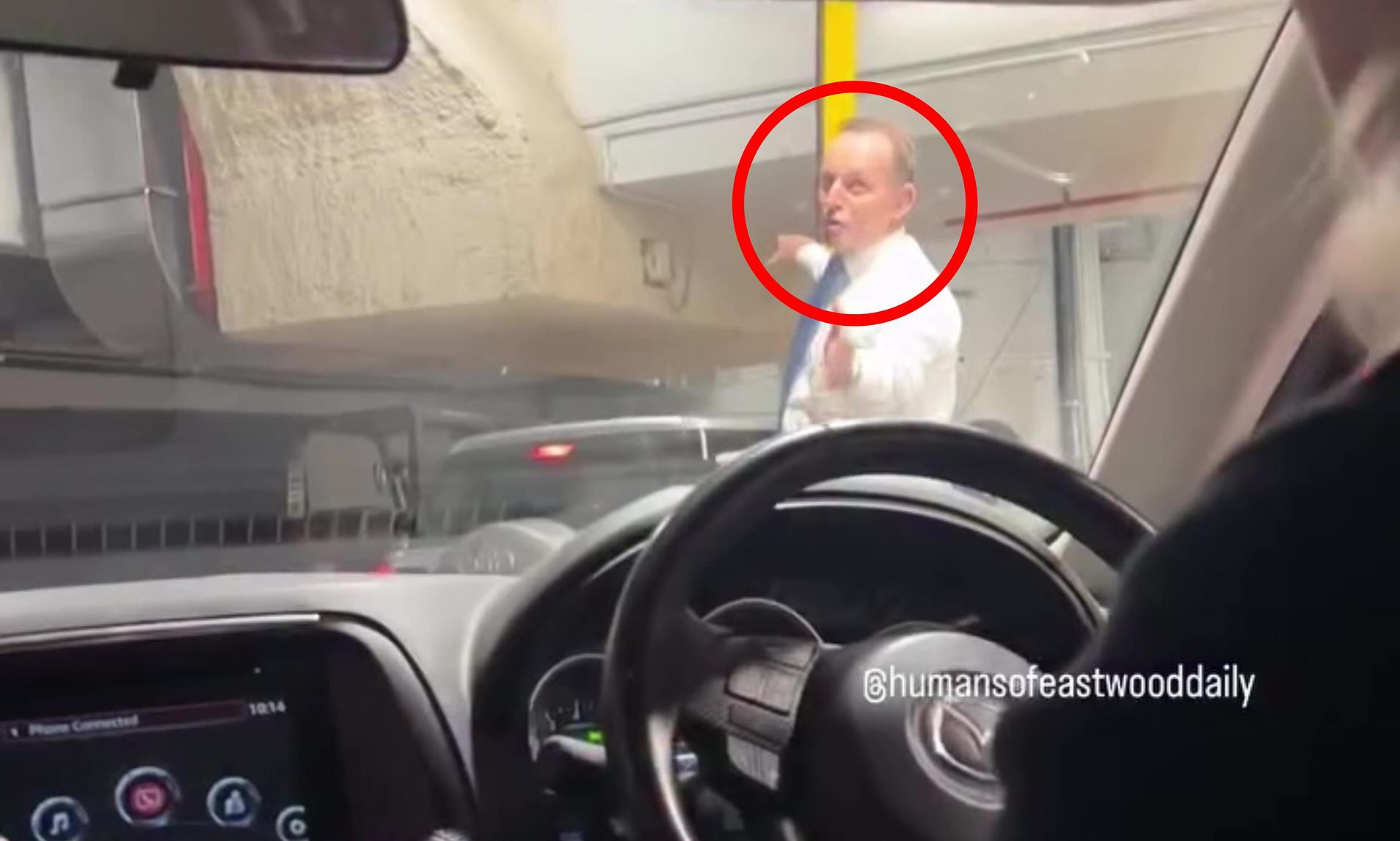 Bizarre moment former Australian prime minister Tony Abbott is seen ...