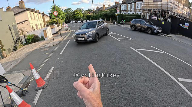Bike vigilante Cycling Mikey returns to scene where he pushed his bike ...