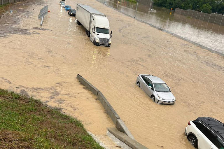 Flash floods engulf Chattanooga as cars vanish underwater as rescues ...