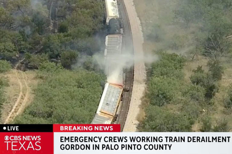 Train derailment horror as 35 cars carrying 'hazardous material' crash ...