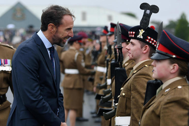 Former England football manager Gareth Southgate congratulates Junior ...