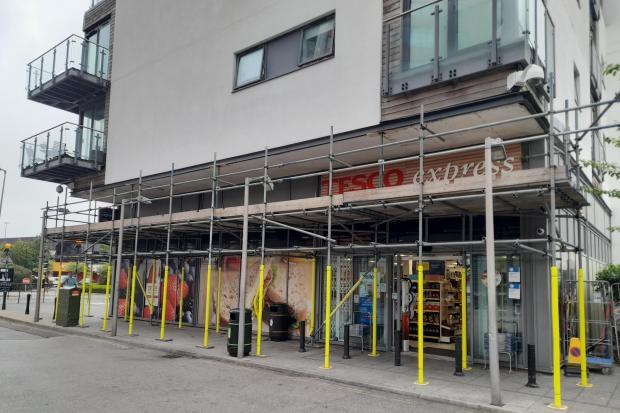 Tesco Express reopens after closing for two days because roof covering ...