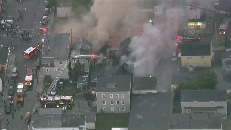 Fire hydrants, heat pose challenges as fire tears through city block