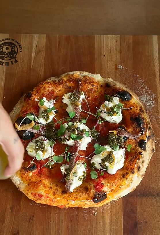 Fancy Pizza Made in a Big Horn Pizza Oven