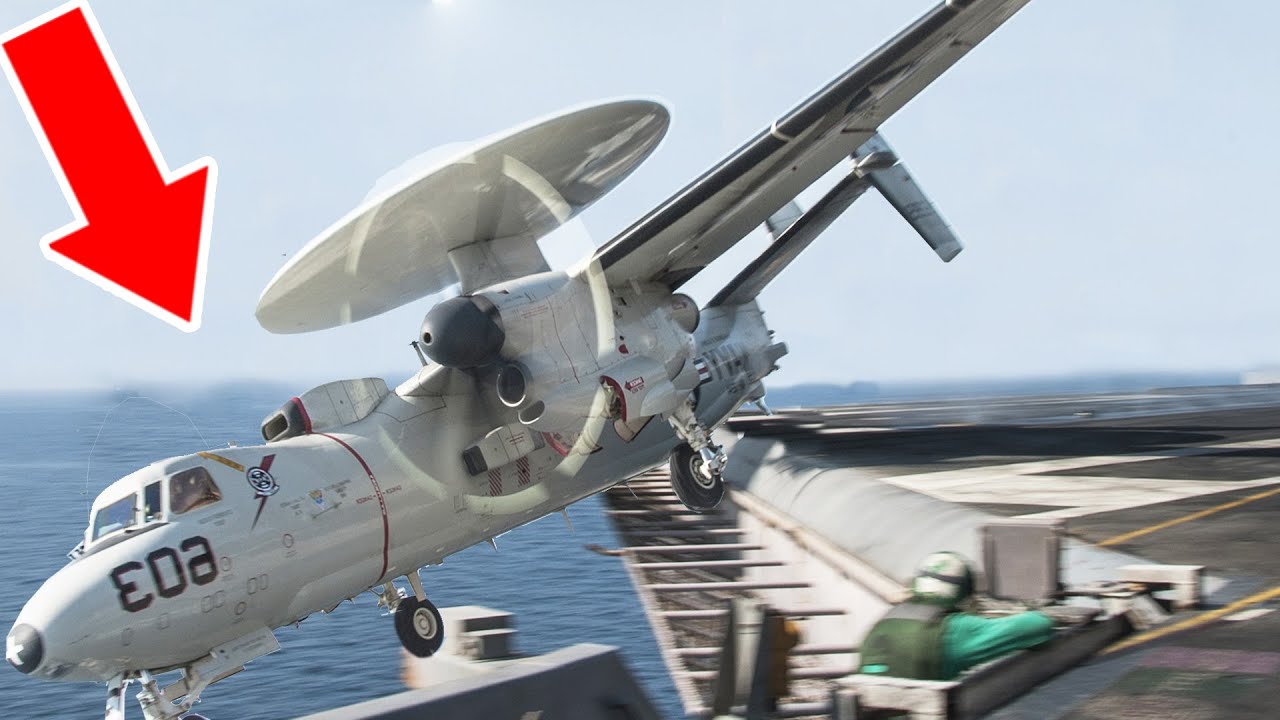Aircraft nearly crashes into ocean after landing on US aircraft carrier