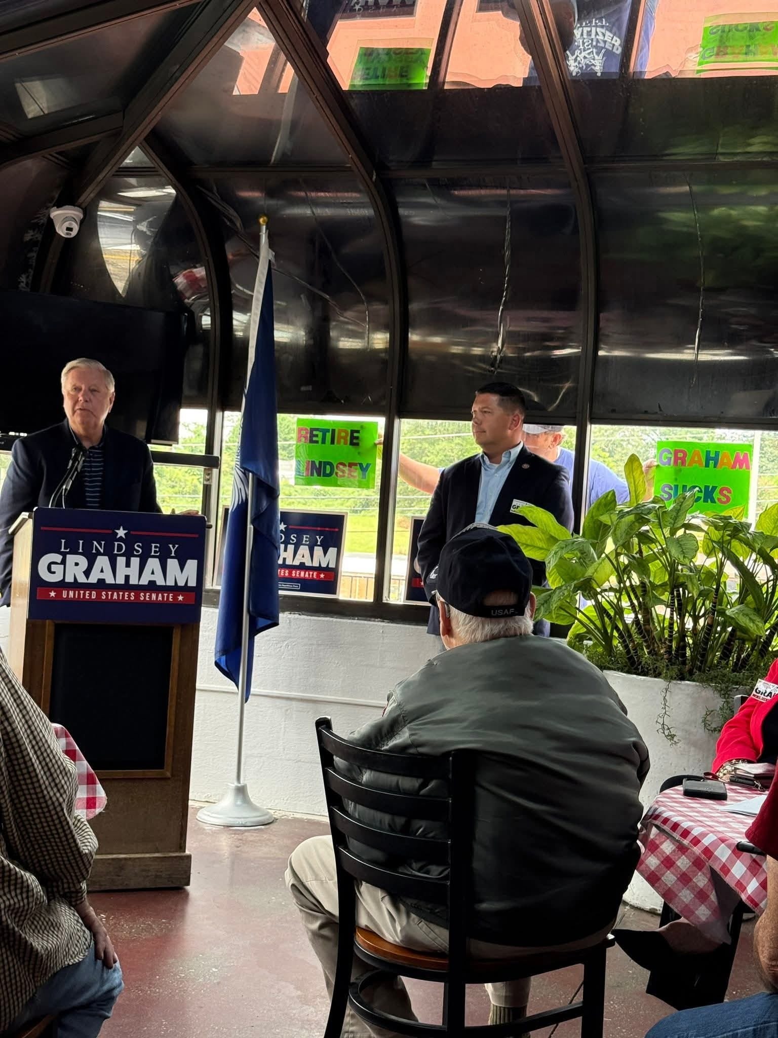 Critics crash Graham's campaign event in the Upstate