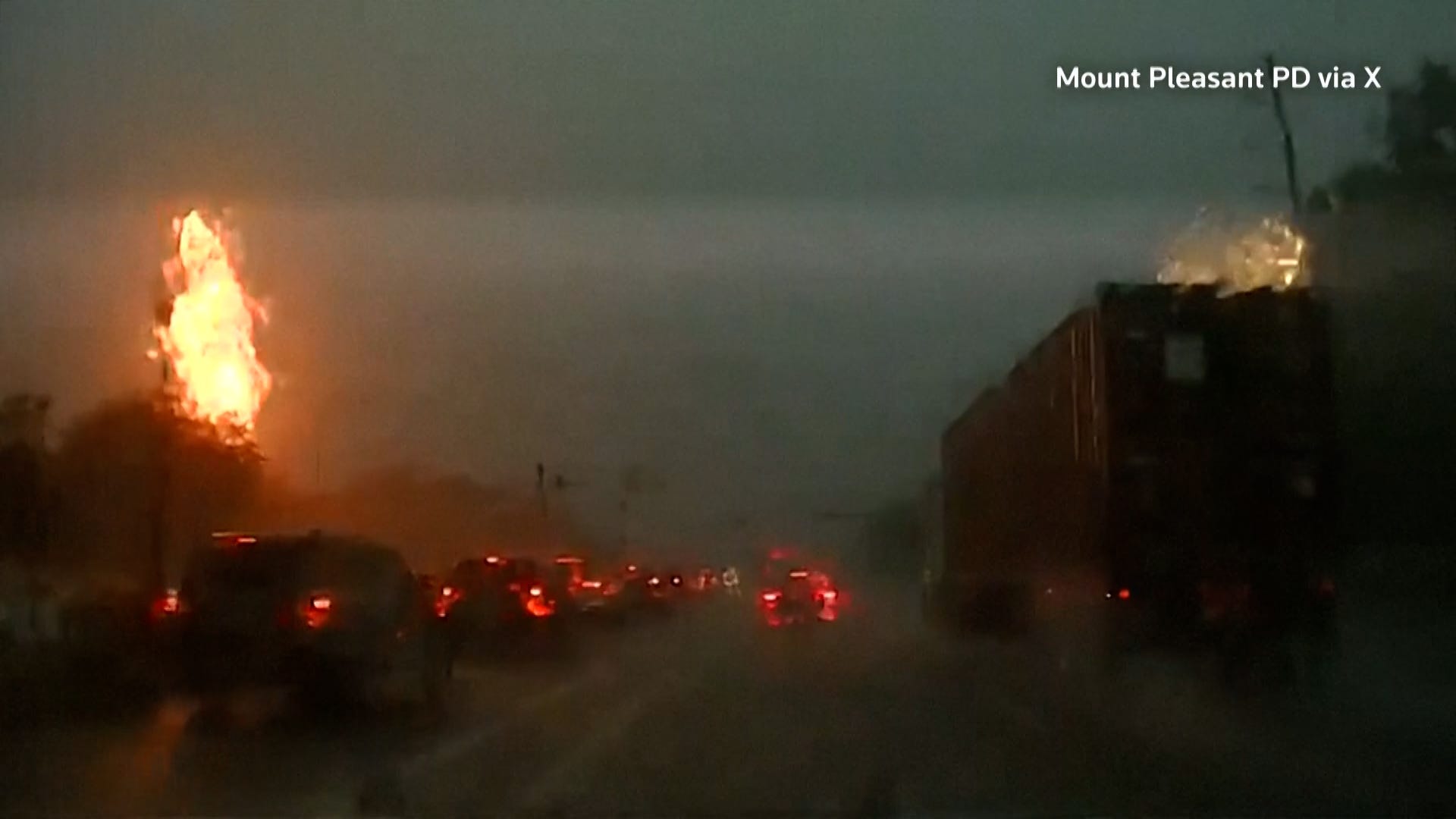 Police dash cam footage captures moment lightning sparks explosion in ...