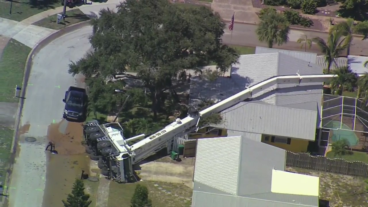 Crane collapses on home in Merritt Island