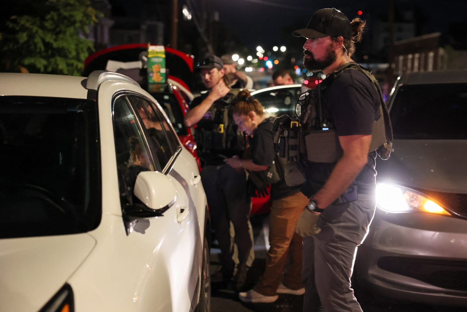 'Get used to it!' More Trump chaos as feds swarm traffic stop in DC ...