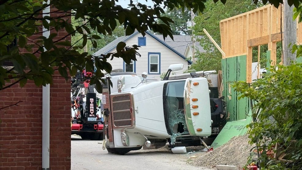 Crane tips over in Providence, knocking out power and blocking street