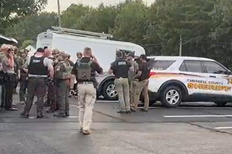 Two deputies shot serving warrant in Virginia standoff