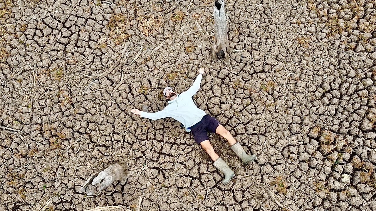 Exploring dried lake reveals lost fishing gear, vintage bottles