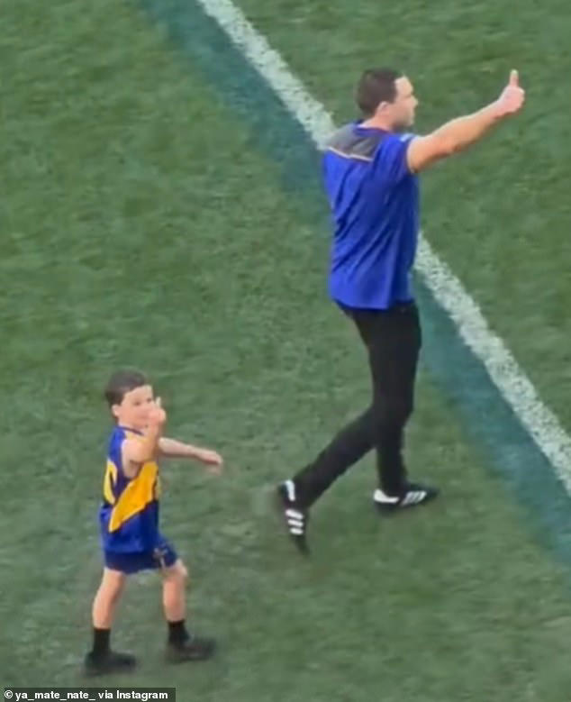 Here's why a footy star had T-shirts made after his son flipped the ...