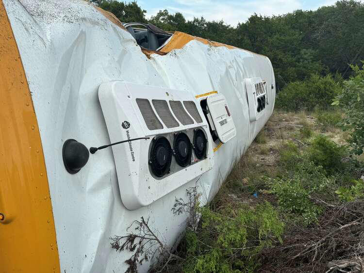 Rollover bus crash injures 17 on first day of school in Texas