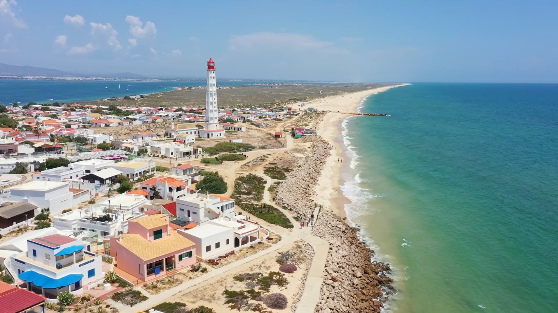 Drone Flight Over Ilha do Farol's Stunning Lighthouse & Shores