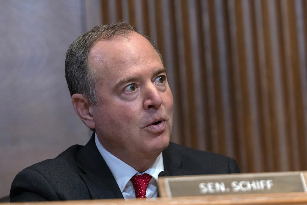 Schiff report details thousands spent on Trump posters hanging from ...