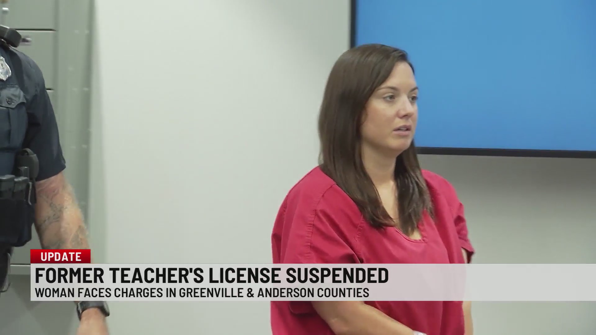 Former teacher's license suspended while facing charges