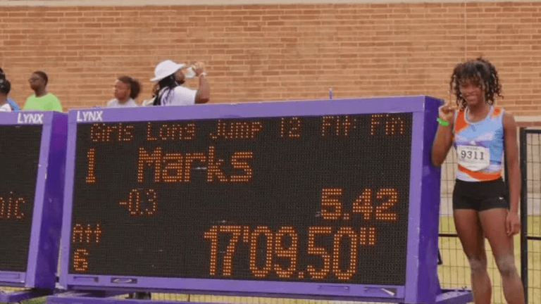 12-year-old Jenesis Marks wins gold with record-breaking long jump ...